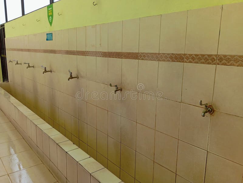 Row of Faucets for Ablution in the Mosque. Stock Photo - Image of ...