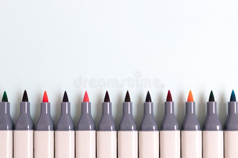 Row of Felt Tip Pens on a Blue Background. Stock Image - Image of ...
