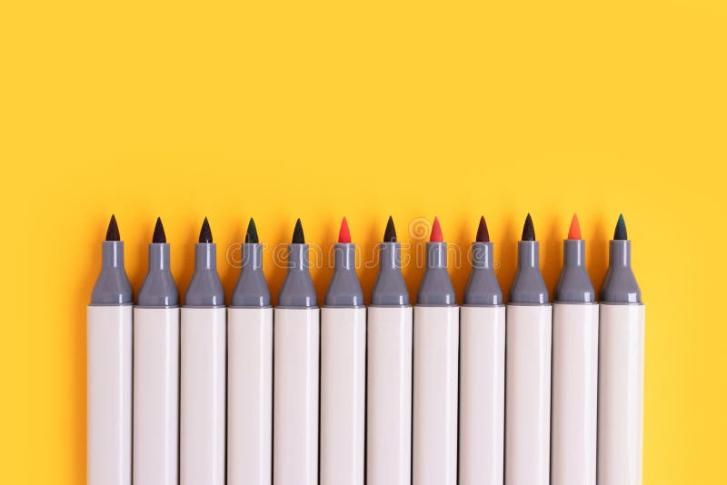 Row of Felt Tip Pens on a Yellow Background. Stock Photo - Image of ...