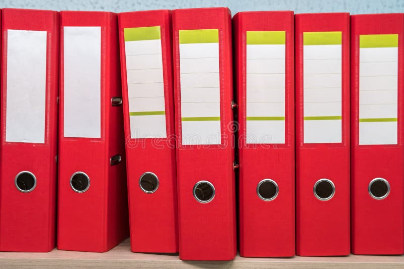 Row of Folders for Papers and Documentation on a Shelf in the Office ...