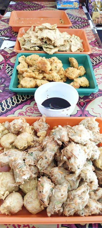 A Row of Fried Snacks on a Tray on the Table Stock Photo - Image of ...