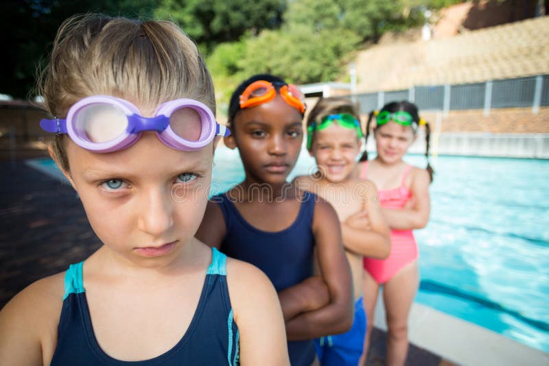 Row of Friends Standing at Pool Side Stock Photo - Image of girl, pool ...