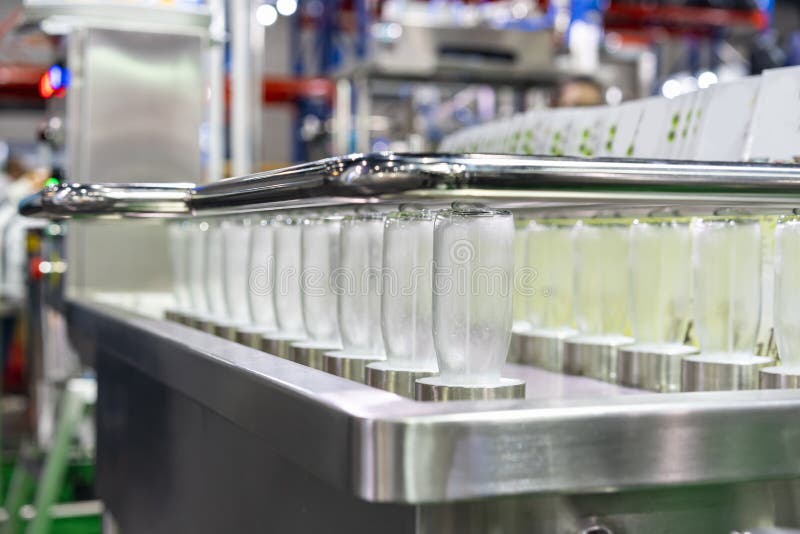 Row Glass Bottle Arrange on Automatic Bottle Washer and Sanitizing ...