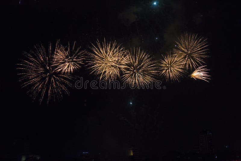 Fireworks Exploding Over the Ocean at Night Stock Photo - Image of ...
