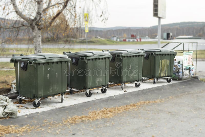 Row of Green Plastic Bin and Plastic Waste Collection Box Stock Image ...