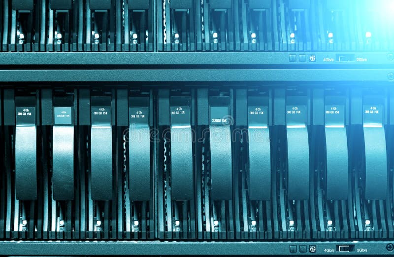 Row of Hard Disks Close-up with Ligh. the Concept of Information ...
