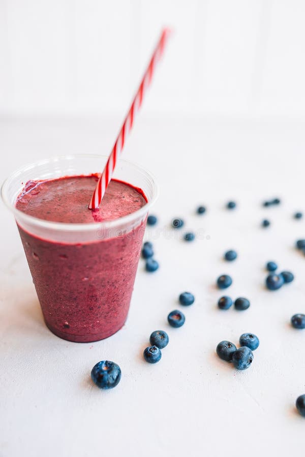Row of Healthy Fresh Fruit and Vegetable Smoothies with Assorted ...