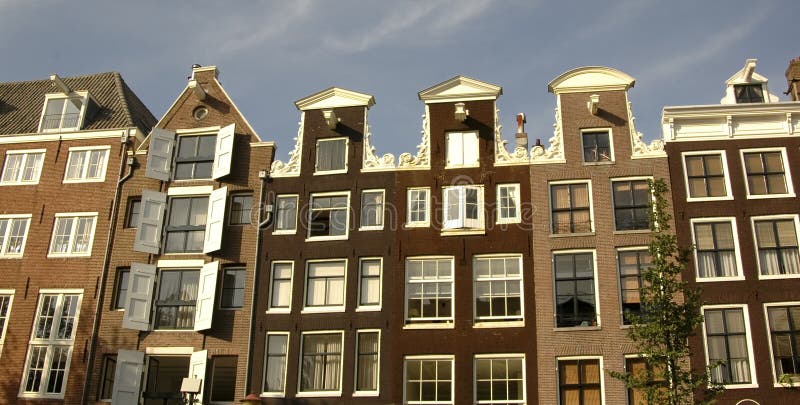 Row houses in Amsterdam stock image. Image of lined, amsterdam - 7598633