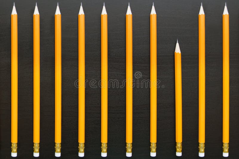 Row of Identical Long Pencils with One Different Short Stock Image ...