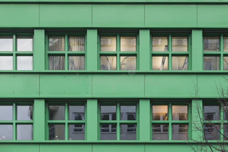 Green bulding windows stock image. Image of urban, light - 110730271