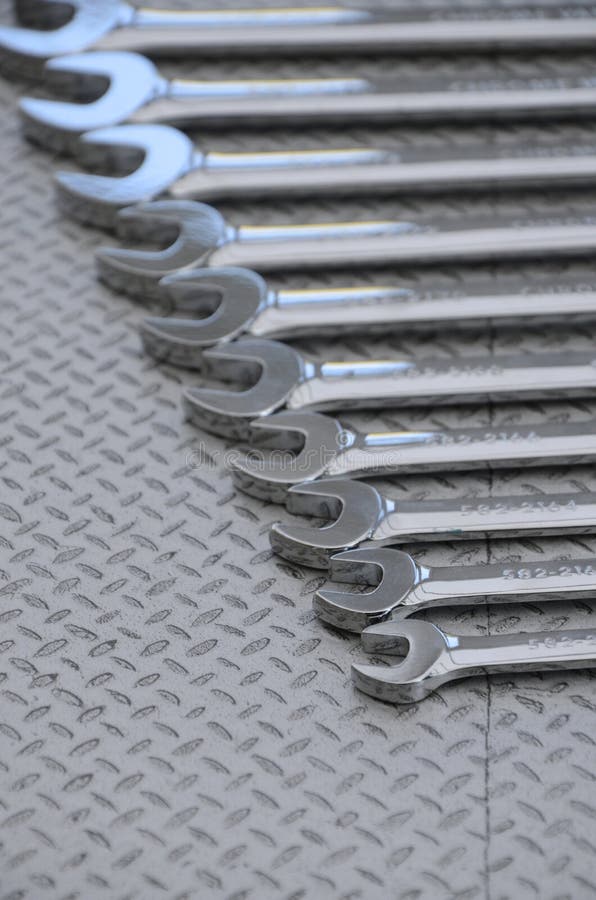 Row of Increasing Sized Spanner Wrenches Stock Photo - Image of labour ...