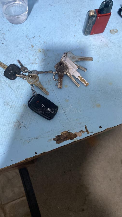 A row of keys on the table stock photo. Image of weapon - 377861004