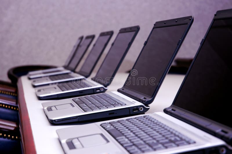 Row of Laptops stock photo. Image of conference, table - 1943916