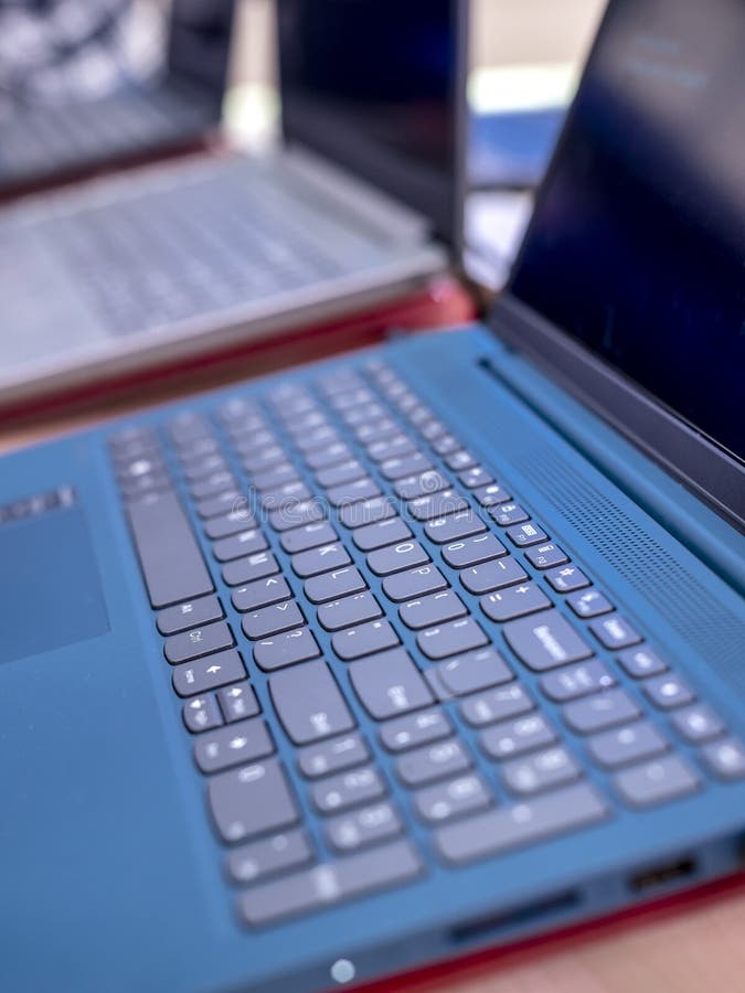 A Row of Laptops for Sale at a Computer Store Stock Photo - Image of ...