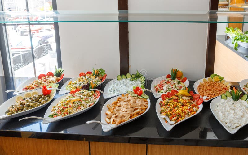 A Row of Large Plates with Various Dishes. Buffet Breakfast Stock Photo ...