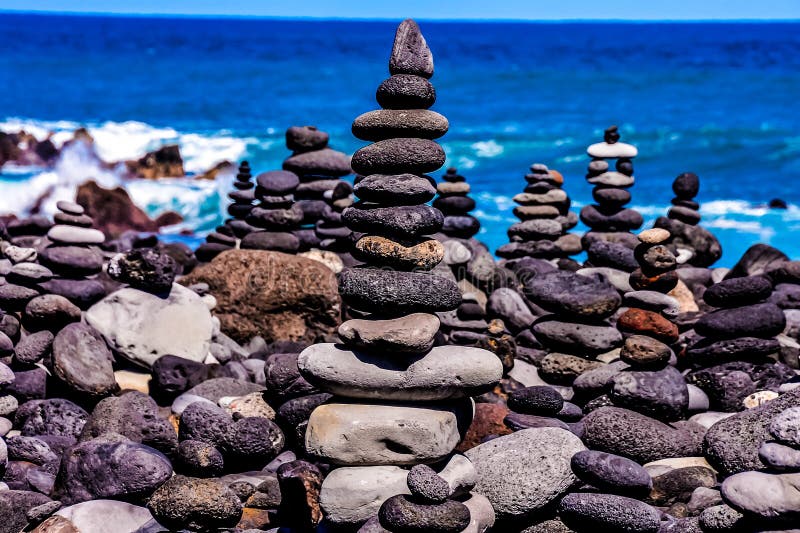 A Row of Large Rocks are Stacked on Top of Each Other, Creating a ...