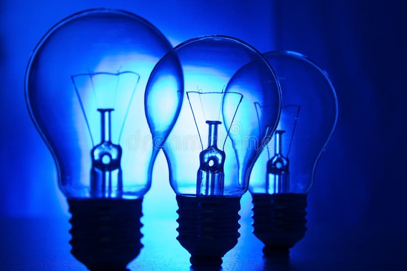 Row of Light Bulbs on a Bright Blue Background Stock Photo - Image of ...