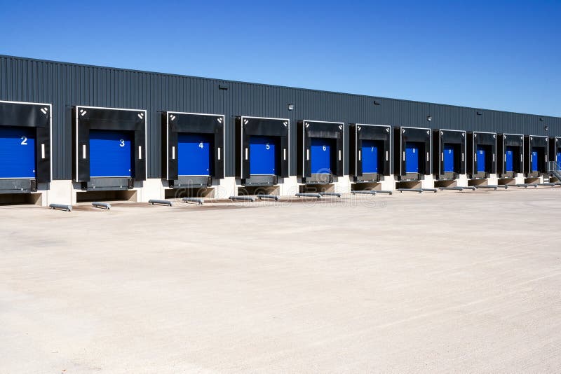 Row of Loading Docks with Shutter Doors at an Industrial Warehouse ...