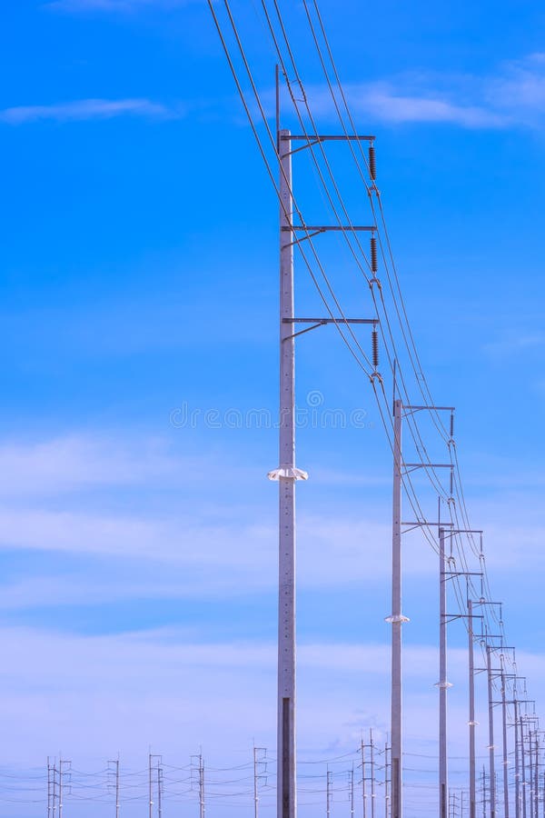 Row of Many Electric Poles and Cable Lines in Curve Line Pattern ...