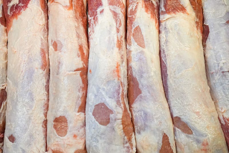A Row of Meat is Displayed in a Butcher Shop Stock Photo - Image of ...