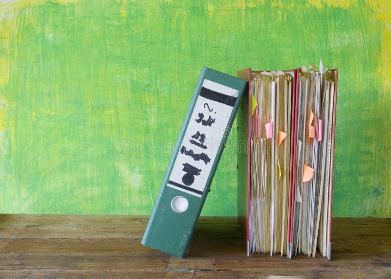 Row of messy file folders, stock image. Image of archive - 39834953