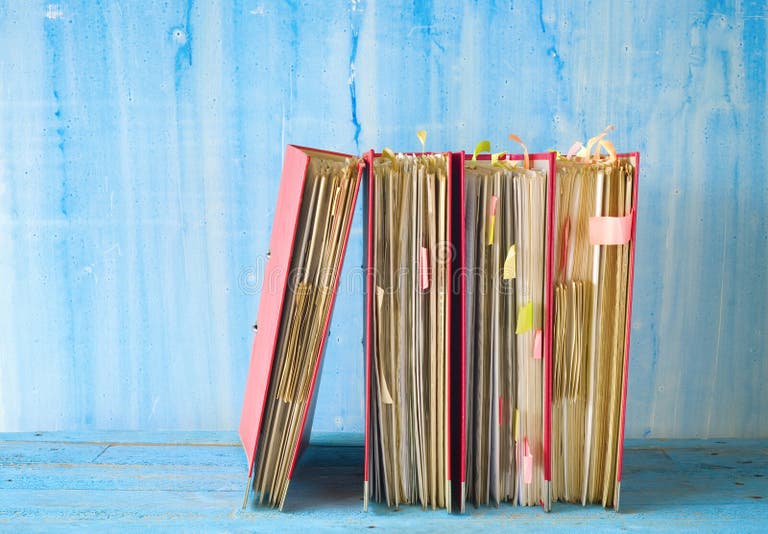 Row of messy file folders stock photo. Image of bills - 47769488