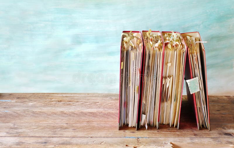 Row of Messy Old File Folders and Documents, Red Tape, Bureaucracy ...