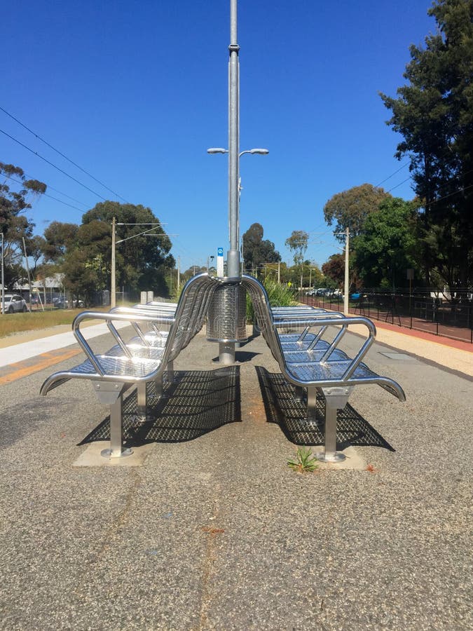 Row of Metal Seats at a Railway Station Stock Photo - Image of public ...