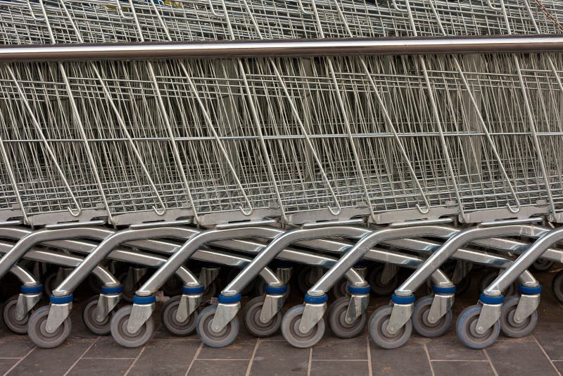 Row of Metal Shopping Carts Stock Image - Image of commerce, cage: 19017951