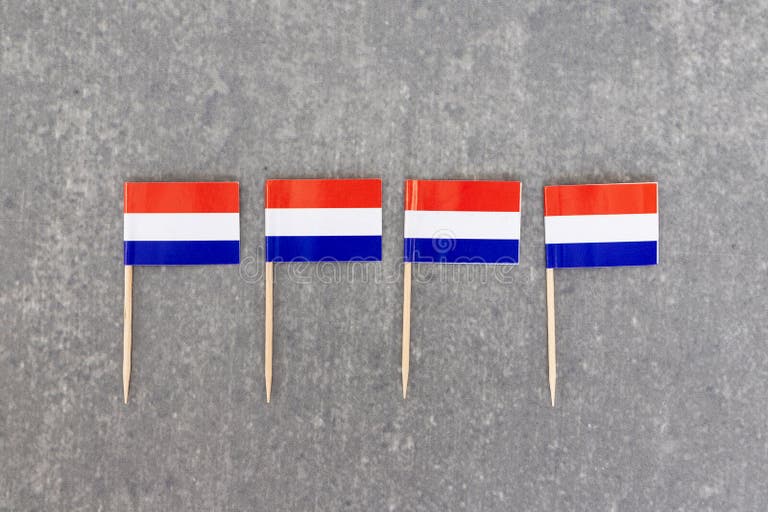 Row of Mini Dutch Flags on Gray Background Stock Photo - Image of ...