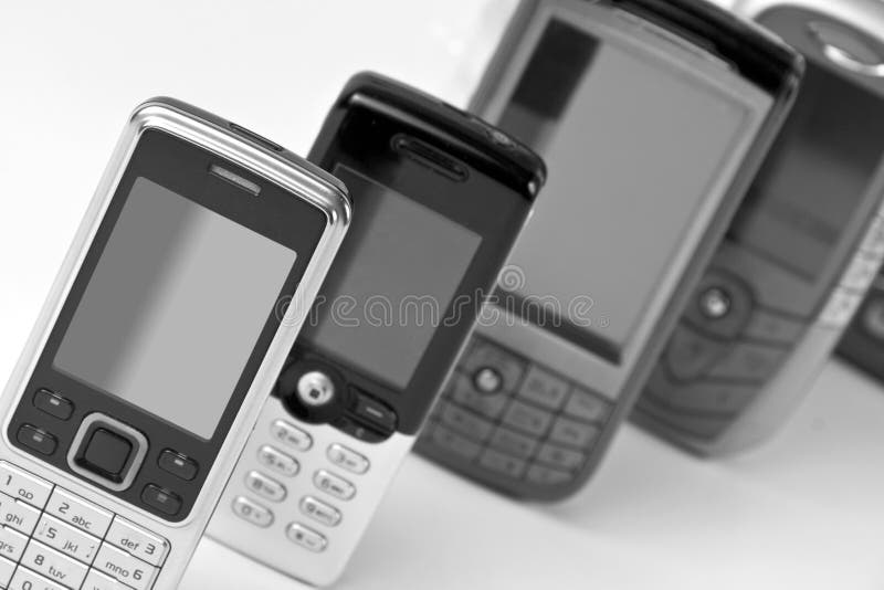 Three Different Types of Mobile Phones Stock Photo - Image of screen ...