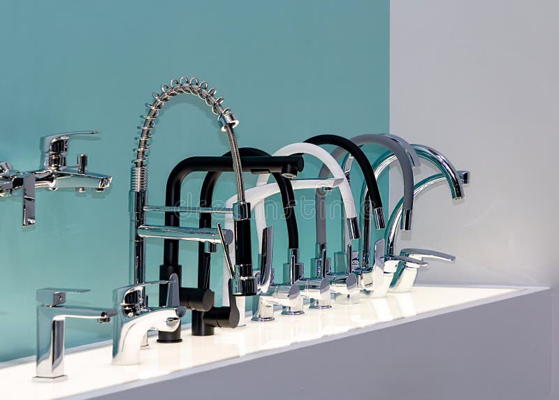 Row of modern kitchen taps stock image. Image of shop - 334021731