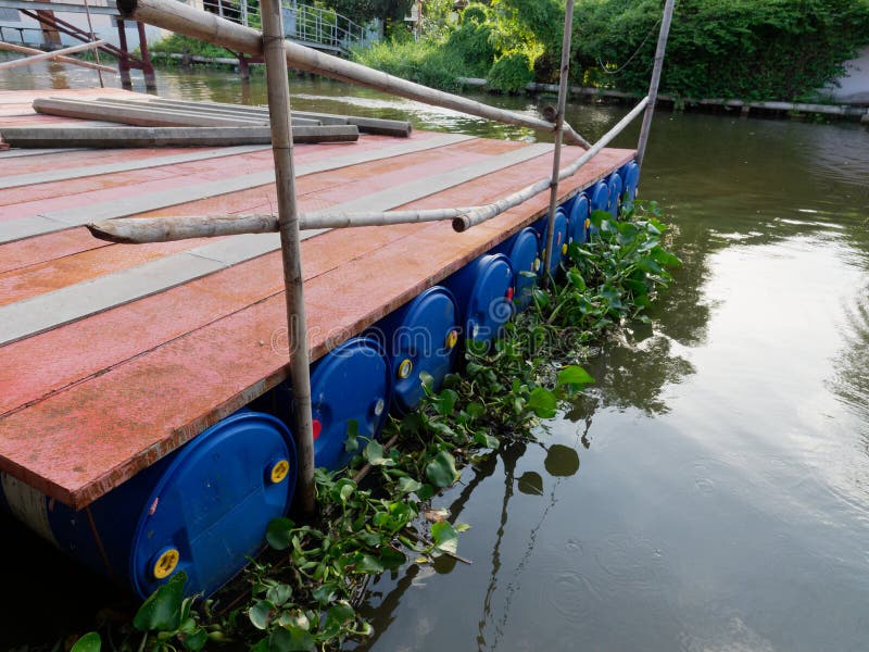 Row of Multi Purpose Blue Plastic Drum, Barrel, or Container Used As ...