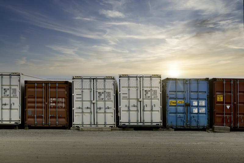 Row of Multiple Stacked Shipping Containers in a Line Formation with a ...