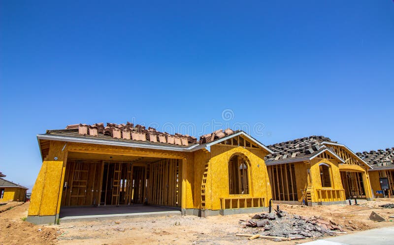 Row of One Story Homes Under Construction Stock Image - Image of lumber ...