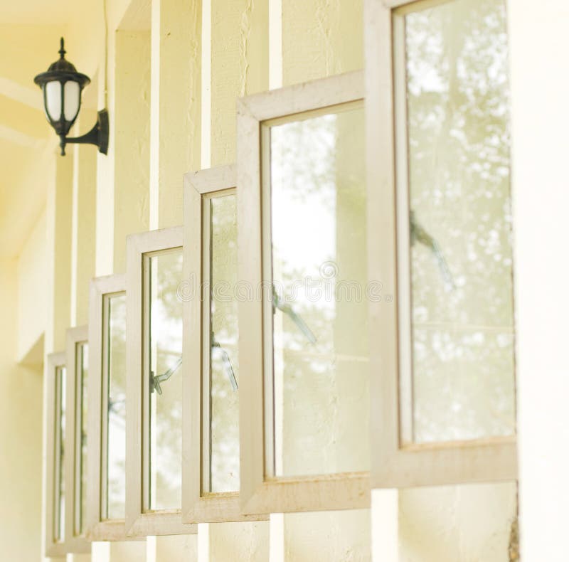 Row of opened windows stock photo. Image of lantern, glass - 15768138