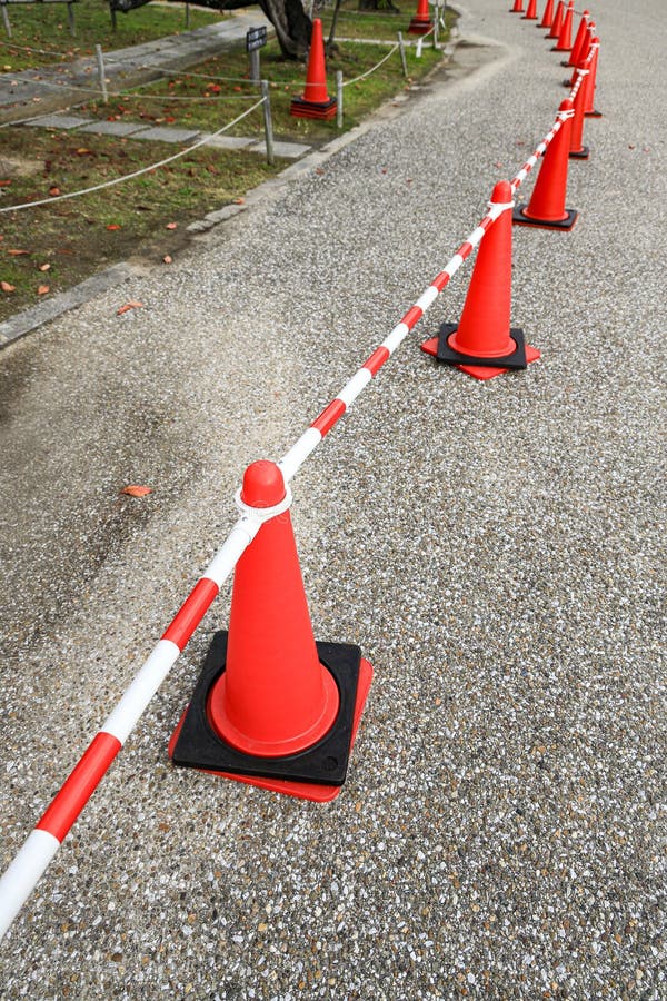 Row of Orange Fluorescent, Reflex Traffic Cones on Road Stock Image ...