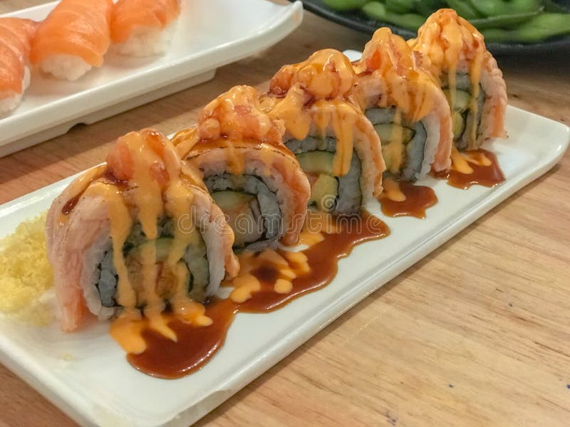 Orange sushi on the plate stock photo. Image of dish - 112340172