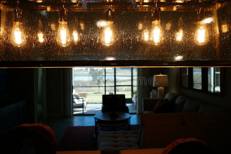 Row of Overhead Lightbulbs in Cabinet Stock Photo - Image of design ...