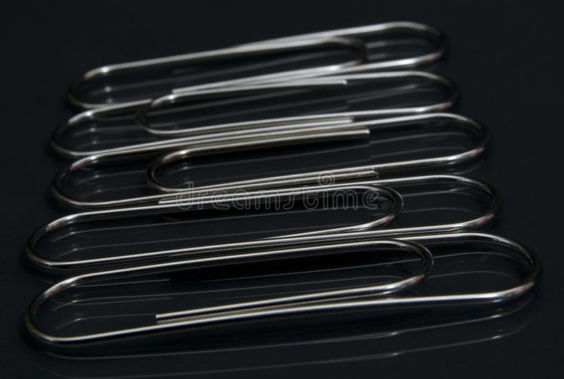 Row of Paper Clips stock photo. Image of black, curve - 11278778