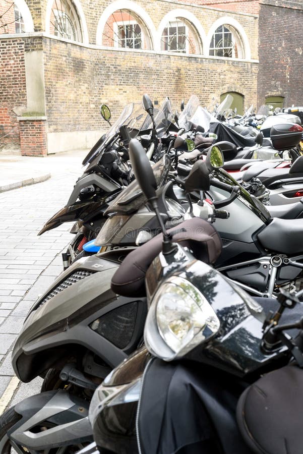 Row of Parked Motorcycles editorial stock photo. Image of road - 106344798