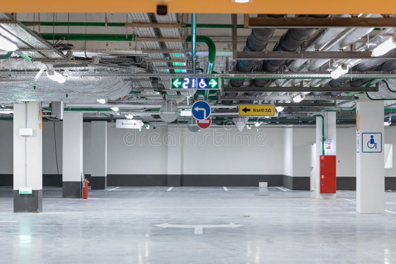 Row of Parking Spaces with Traffic Control Signs and Empty Places ...