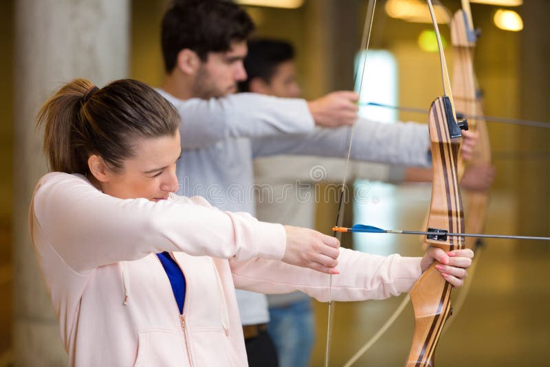Row People Aiming with Their Archery Bows Stock Image - Image of hold ...