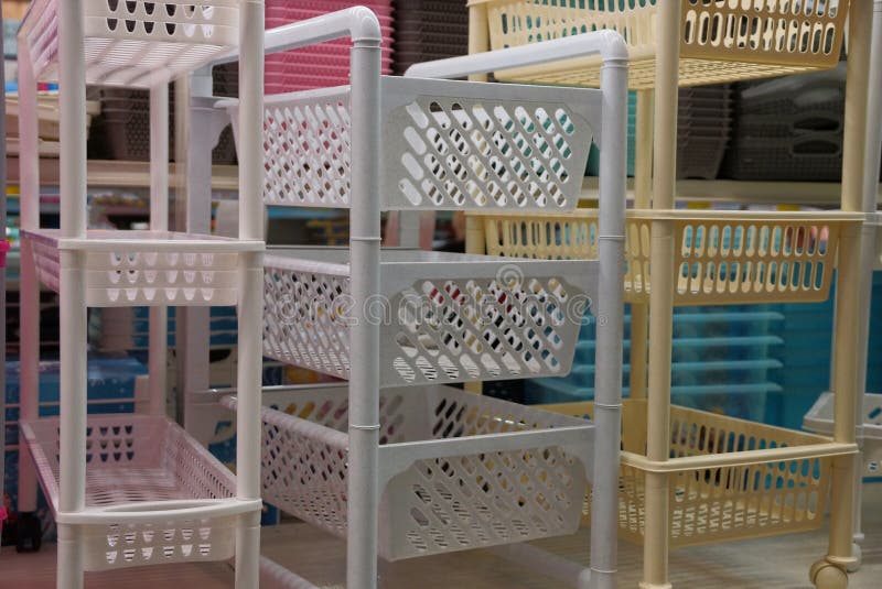 A Row of Plastic Colored Shelves with Empty Boxes Stock Photo - Image ...