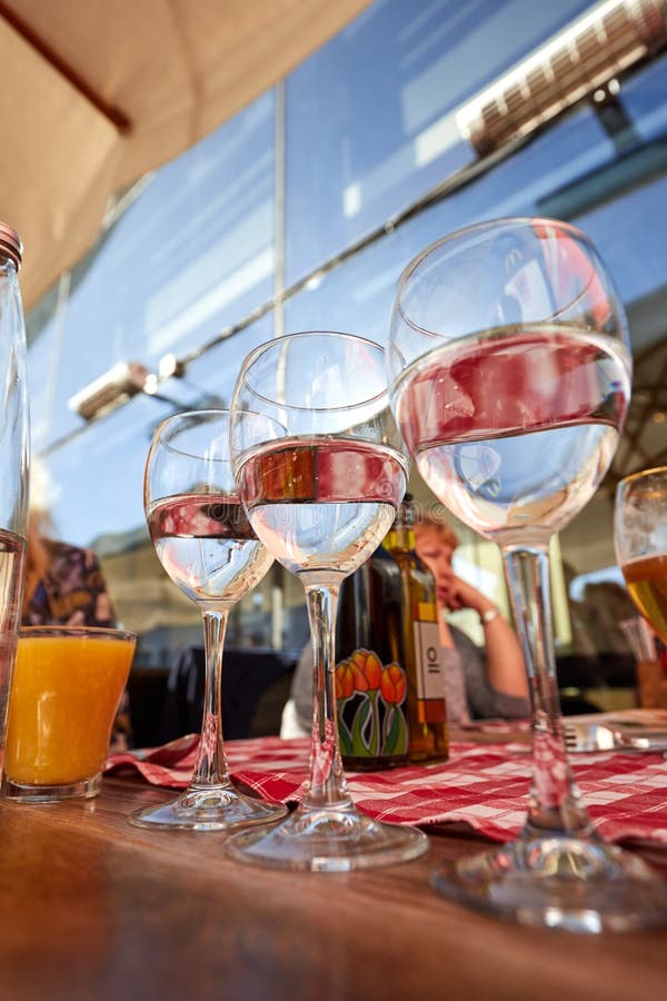 Row of Pure Drinking Water Glasses at Summer Terrace Cafe. Stock Photo ...