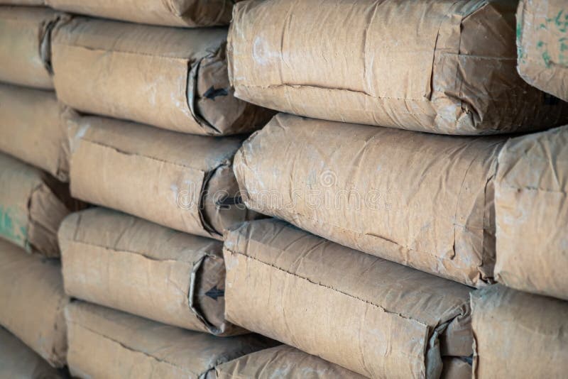 Row of Raw Brown Cement Bag Lay Stack in the Construction Work Site ...