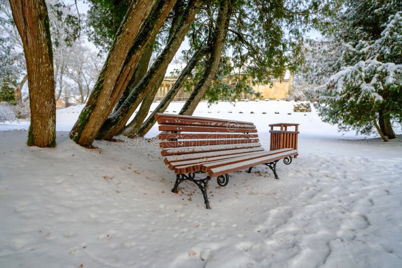 Row of Red Benches in the Park in the Snow in Winter Stock Image ...