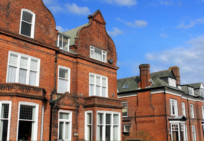 Row of Red Brick Houses in Street Stock Image - Image of homes, angle ...