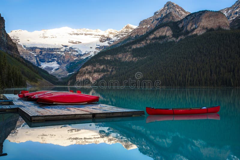 Row of Canoes, Banff National Park Stock Image - Image of national ...