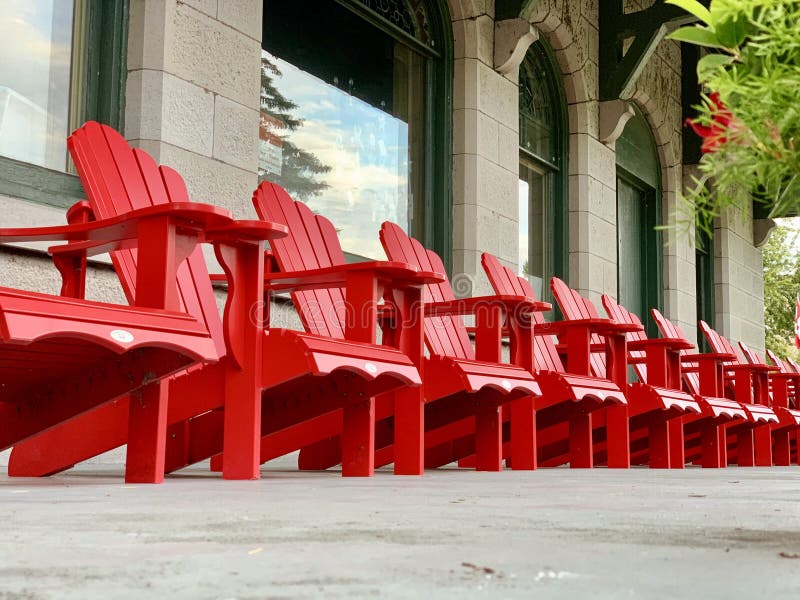 Row of red chairs stock image. Image of line, summer - 174564293